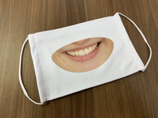 Japanese Staff Wear “Smile Masks” To Look Friendlier