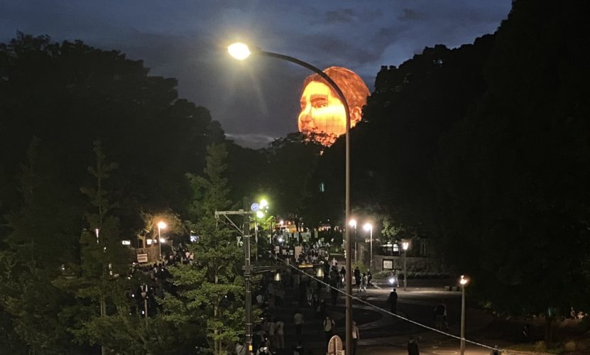 Giant Floating Head In Tokyo Looks Like The Colossal Titan From AOT