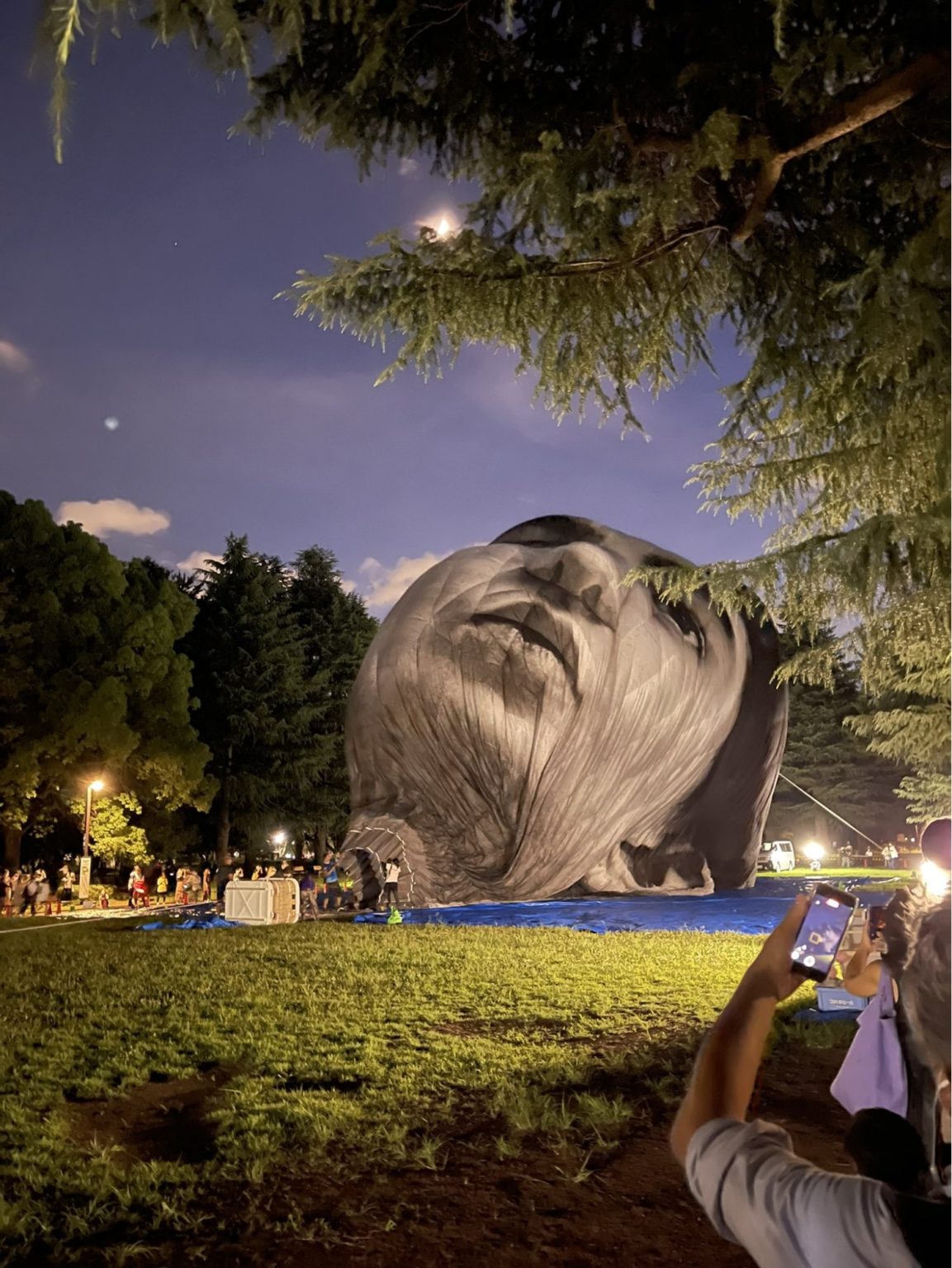 Giant Floating Head In Tokyo Looks Like The Colossal Titan From AOT